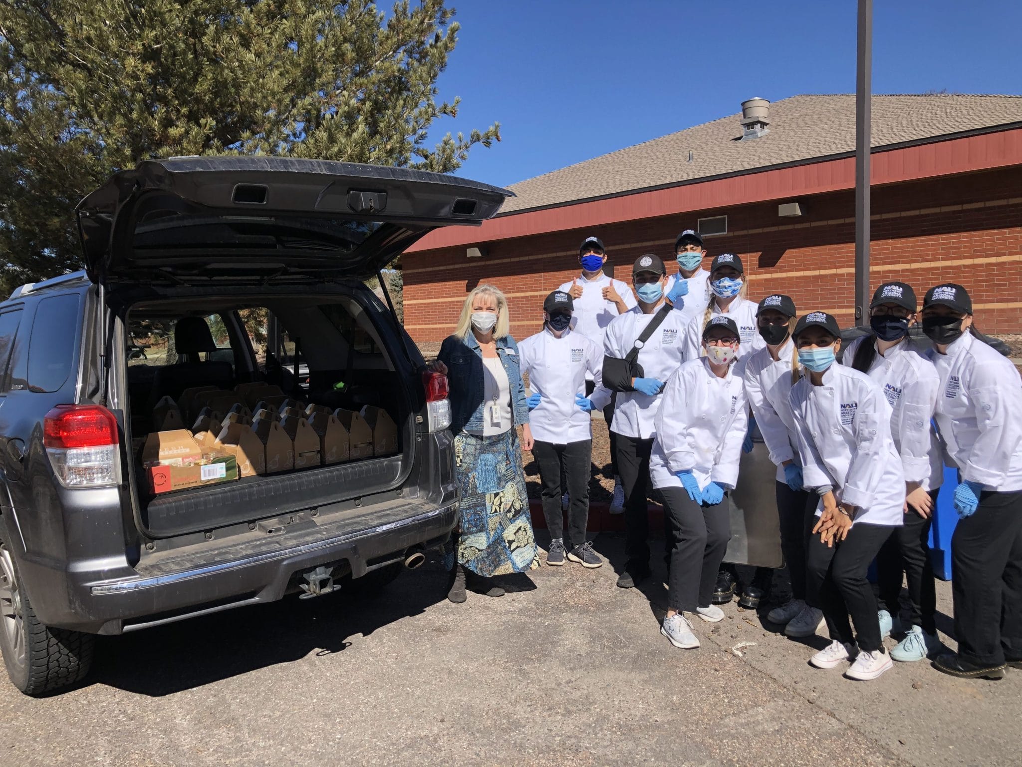 Sharing happiness with Adult Happy Meals: NAU HRM students cook up care ...